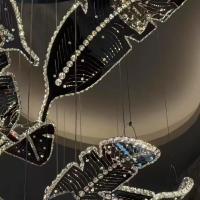China Luxury Crystal Feather Chandelier Modern Leaf Pendant Light for Staircase & Villa for sale
