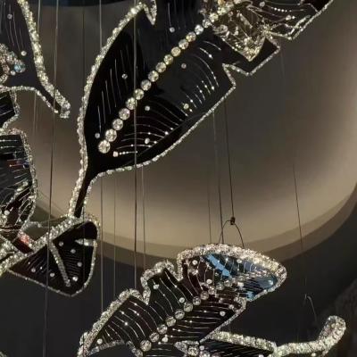 China Luxury Crystal Feather Chandelier Modern Leaf Pendant Light for Staircase & Villa for sale