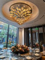 China Creative Designer Light Luxury Hotel Lobby Loft Villa Living Room Petal Staircase Custom Chandelier Warm White Contemporary for sale