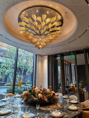 China Creative Designer Light Luxury Hotel Lobby Loft Villa Living Room Petal Staircase Custom Chandelier Warm White Contemporary for sale