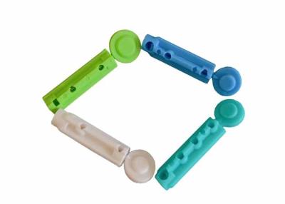 China Automatic Lancing Device Twist Blood Lancet Orange White Tri Beveled Tip Sterile 28g for sale