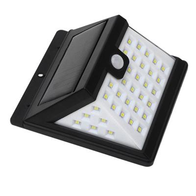 China Wall Light for Patio Yard Deck Garage Fence motion sensor soloar light Wide Angle Lighting for sale