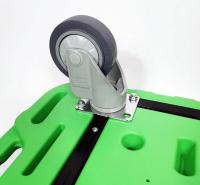 China 300kg Capacity Plastic Platform Trolley Hand Cart with Four-Wheel Design for Warehouse and Industrial Use for sale