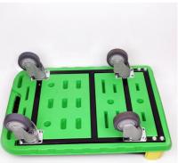 China 300kg Capacity Plastic Platform Trolley Hand Cart with Four-Wheel Design for Warehouse and Industrial Use for sale