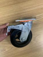 China Heavy Duty 4 Inch Cast Iron Core Rubber Swivel Caster Wheel with Top Plate Brake 180kg Load Capacity for sale