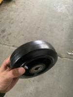 China Heavy Duty 4 Inch Cast Iron Core Rubber Swivel Caster Wheel with Top Plate Brake 180kg Load Capacity for sale