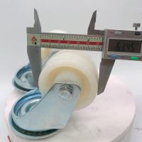 China 65mm Medium Duty Plain Bearing Nylon Caster Wheel 80kg Wear Resistant Flat Free Castor for sale