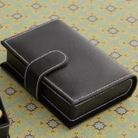 China Luxury Leather Travel Jewelry Case Portable Travel Book Shape Jewelry Packaging Box for sale