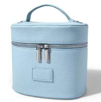 China OEM Portable Handle Leather Cosmetic Cases Ladies Travel Toiletry Bag Light Blue Color for sale