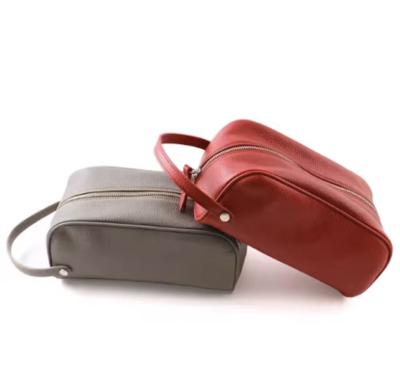 China Custom Color Travel PU Leather Toiletry Bag Portable Handle Essentials Wash Bag For Men for sale