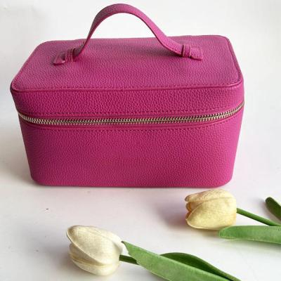 China Portable Handle Women's Leather Makeup Bag Pu Pebble Leather Toiletry Travel Bags for sale