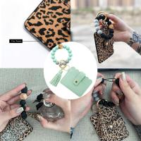 China Stylish Artificial Leather Card Holders Ladies Business Card Wallet With Keyring Bracelet for sale
