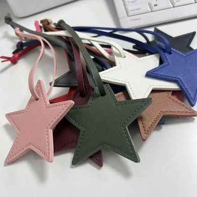 China OEM ODM Star Shape Leather Handbag Tag Vegan Luxury Leather Loop Travel Bag Tags for sale