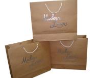 China Custom Cheap Brown Paper Shopping Bags With Artwork Printing Wholesale for sale