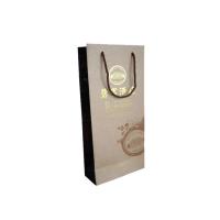 China Printed Clothing Paper Shopping Bags With Gold Foil Hot Stamping Embossed Logo for sale