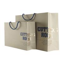 China Custom Boutique Paper Gift Bags Packaging With Gold Foil Stamping Logo Suppliers for sale