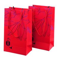 China Promotional Custom Printed Red Paper Bags Gift Package With Cotton Handle Rope for sale