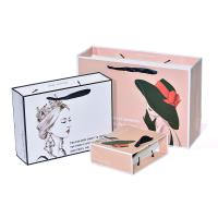 China Custom Printed Biodegradable Paper Carrier Bags Wholesale With Bowknot for sale