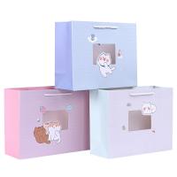China Printed Black Paper Shopping Bags Gift Window Packaging Bags With Handles Wholesale for sale