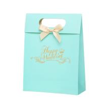 China Custom Promotional Flat Bottom Paper Bags Champion Printing Die Cutting Handles for sale