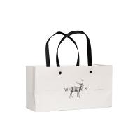 China Custom Personalized Printed White Kraft Paper Carrier Bags With Flat Handles for sale