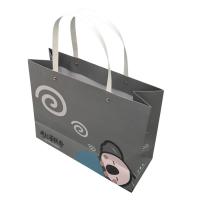 China Custom Personalized Printed White Kraft Paper Carrier Bags With Flat Handles for sale