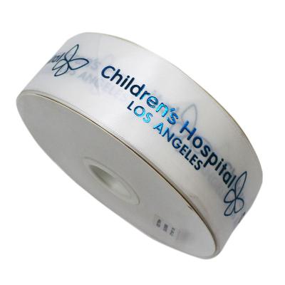 China Personalized Custom Polyester Satin Ribbon With Blue Foil Logo – Luxury Branding Ribbon for sale