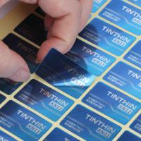 China Custom Silver Foil Stickers – Waterproof Self-Adhesive Metallic Labels With Artwork Printing for sale
