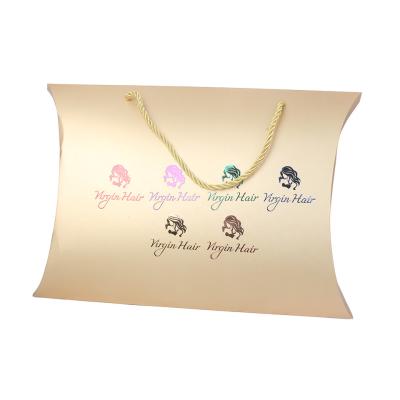 China Custom Luxury Gold Pillow Boxes with Handle for Wigs – Premium Hair Extension Gift Packaging for sale