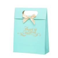 China Custom Wedding Gift Paper Bags with Die-Cut Handles & Ribbon – Luxury Party & Event Packaging for sale