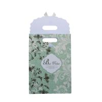 China Custom Wedding Gift Paper Bags with Die-Cut Handles & Ribbon – Luxury Party & Event Packaging for sale
