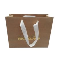 China Printed Kraft Merchandise Bags Brown Kraft Paper Carrier Bags Packaging Wholesale for sale