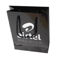 China Custom Small Black Paper Bags Online Jewellery Packaging With Gold Foil Logo for sale