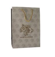 China Printed Clothing Paper Shopping Bags With Gold Foil Hot Stamping Embossed Logo for sale