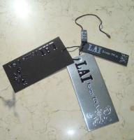 China Custom Silver Garment Tags And Labels Plastic Swing Hang Tags Manufacturers for sale