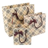 China Custom Printed Biodegradable Paper Carrier Bags Wholesale With Bowknot for sale