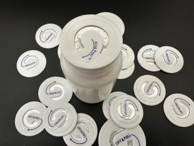 China Apple Peel Lift Tab Liner for Daily Chemical Packaging | Custom Bottle Seal Liner Manufacturer Custom apple peel lift tab liner for plastic bottles, PET bottles, cosmetic and daily chemical packaging. for sale