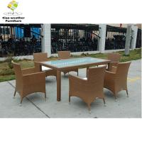 China Modern PE Rattan Garden Patio Dining Table and Chair Set for 6 People Aluminum Frame Adds Elegance for sale