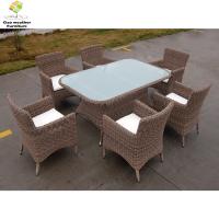 China Modern PE Rattan Garden Patio Dining Table and Chair Set for 6 People Aluminum Frame Adds Elegance for sale