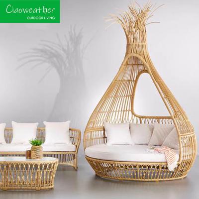 China Modern Outdoor Furniture Wicker Bird's Nest Shaped Sofa Bed with Waterproof Cushion and Woven Rattan Beds for sale