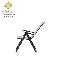 China Outdoor Furniture Glass Extension Dining Table and Folding Chair Set with Weather-resistant Materials for sale