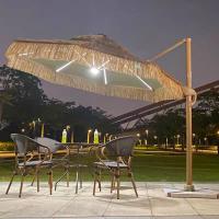 China Large Windproof Hawaiian Parasol Wooden Colored Steel Pole Tiki Thatch Beach Outdoor Balcony Umbrella for Leisure Facilities for sale