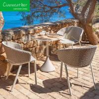 China Outdoor Leisure Hotel Rattan Dining Set with Waterproof Upholstery Cushion and Aluminum Frame in Modern Simplicity Design for sale