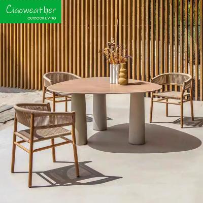 China Outdoor Patio Garden Teak Wood Texture Dining ArmChair with Waterproof Cushion and Foldable Design for sale