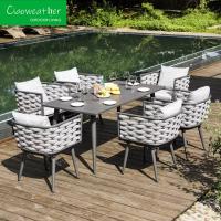China Waterproof Outdoor Dining Set for Villa Garden Luxury Olefin Rope Rattan Weaving and Cushions for sale