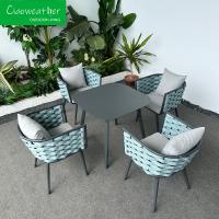 China Waterproof Outdoor Dining Set for Villa Garden Luxury Olefin Rope Rattan Weaving and Cushions for sale