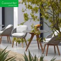 China Outdoor Garden Courtyard Waterproof Fabric Dining Chair with Teakwood Frame and NO Folded Design for sale