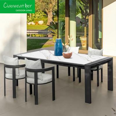 China Standard Size Outdoor Restaurant Patio Furniture with Aluminum Armrest Chairs and Extendable Table for sale