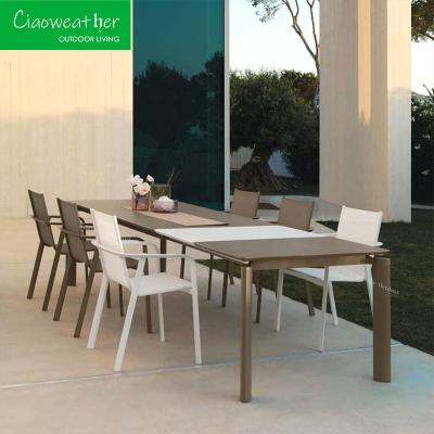 China Modern Design Stackable Garden Armrest Chair for Hotel Restaurant Banquet Rattan Wood Patio Furniture for sale