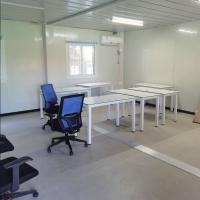 China Steel Door Outdoor Prefabricated Container House for Modular Tiny Storage Office Homes for sale